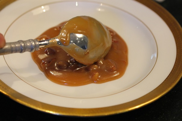 Chocolate Spheres filled with Chocolate Mousse, with Praline Sauce and ...